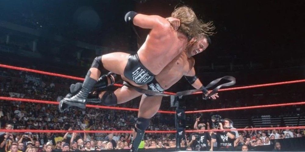 WWE: The 5 WILDEST Strap Matches in Wrestling History, Explained