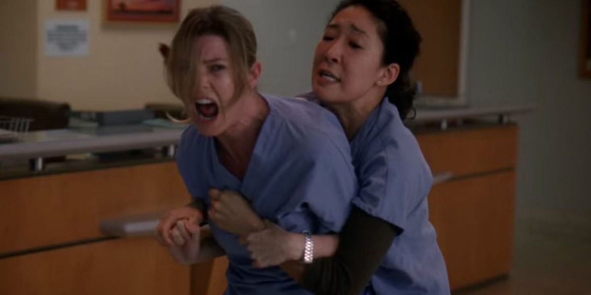 Cristina (Sandra Oh) holds back Meredith (Ellen Pompeo) in Grey's Anatomy's 